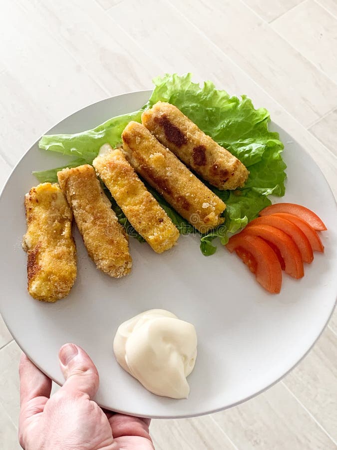 Fried Mozzarella Cheese Sticks Breaded on White Plate Stock Photo ...