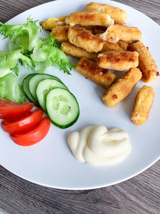 Fried Mozzarella Cheese Sticks Breaded on White Plate Stock Image ...