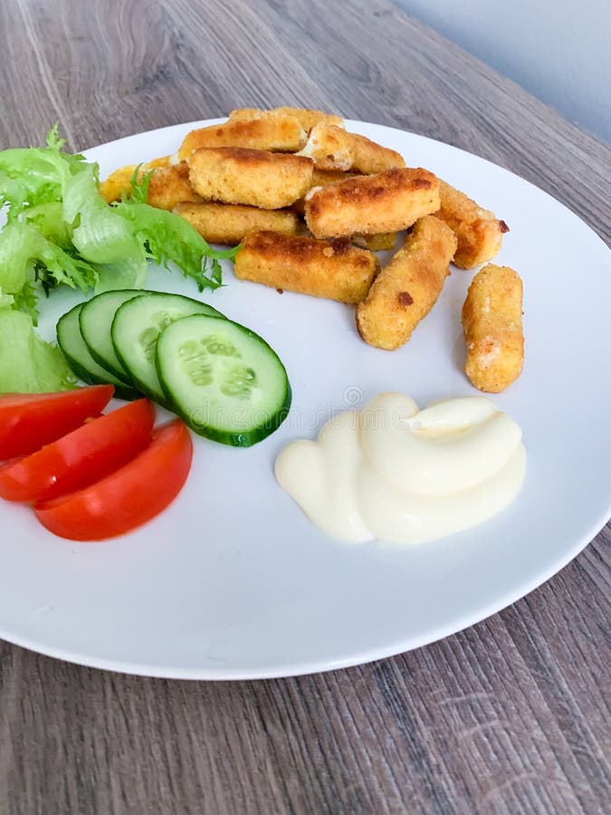 Fried Mozzarella Cheese Sticks Breaded on White Plate Stock Image ...