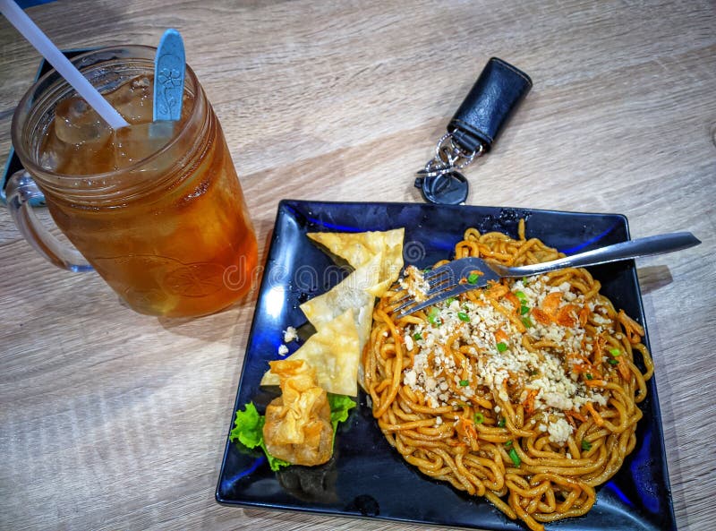Fried Noodles and Iced Tea Very Delicius Stock Photo - Image of ...