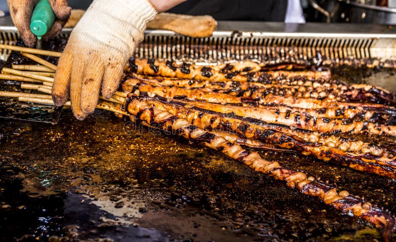 Fried Octopus on a Stick stock image. Image of vendor - 80406821