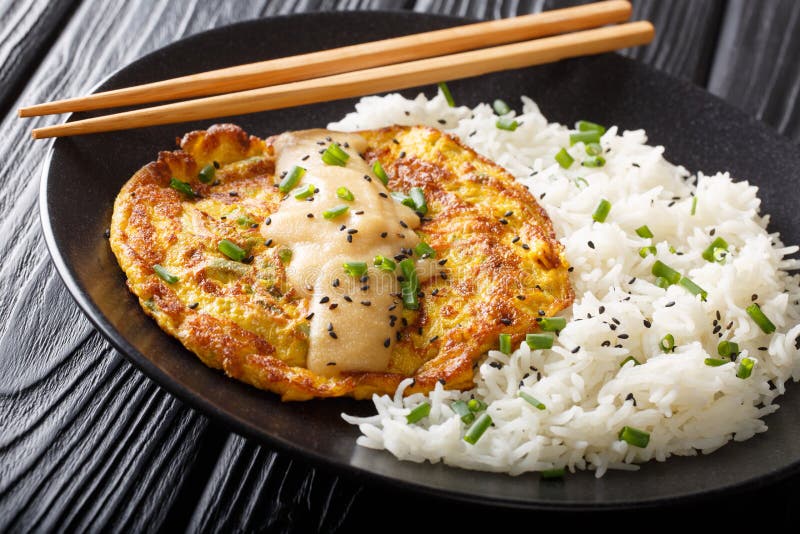 Fried Omelet Mixed with Bean Sprouts and Ground Meat Served with a Side ...