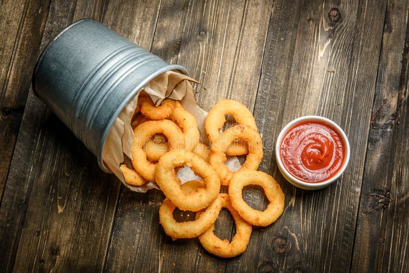 Fried Onion Rings in Basket Stock Photo - Image of snack, nutrition ...