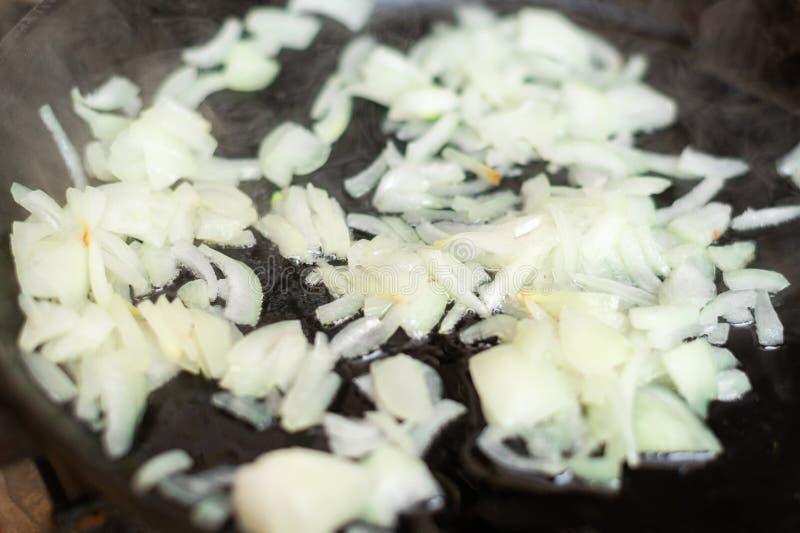 Fried Onions in a Pan. Preparation for Cooking Dishes with Onions Stock ...