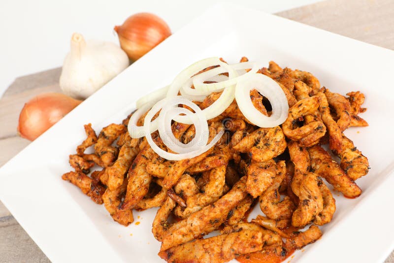 Pan gyros on a plate stock photo. Image of marinated - 109689066