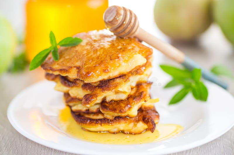 Fried Pancakes with Apples and Honey Stock Image - Image of texture ...