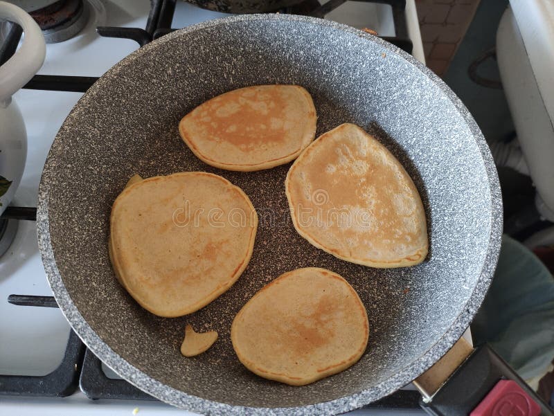 Fried Pancakes in a Frying Pan Stock Photo - Image of delicious, fresh ...