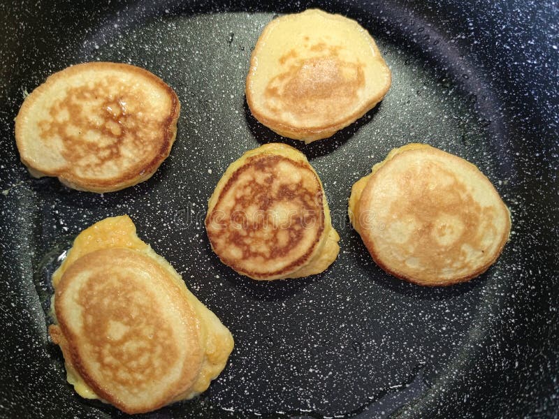 Fried Pancakes on a Granite Frying Pan Close-up from Above Stock Image ...