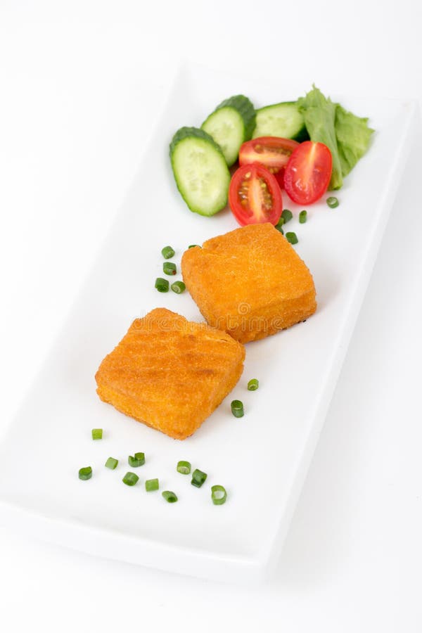 Fried parmesan cheese cube stock photo. Image of parmesan - 105820030