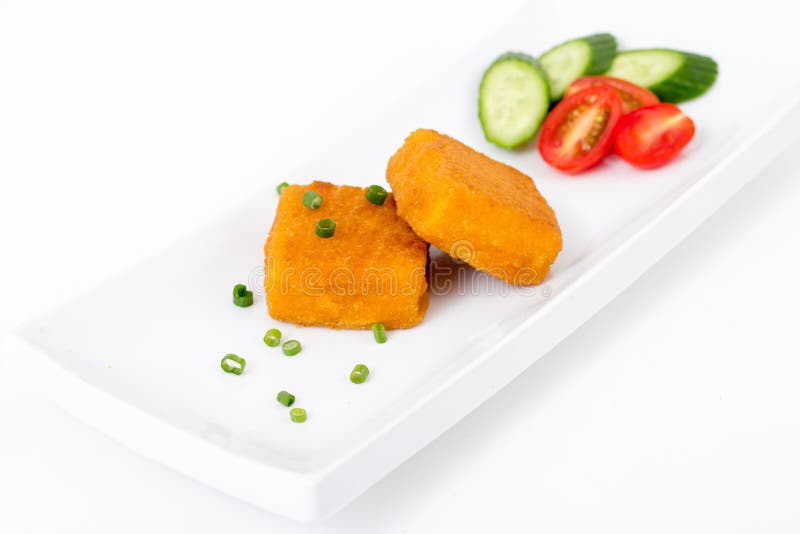 Fried parmesan cheese cube stock photo. Image of parmesan - 105820030