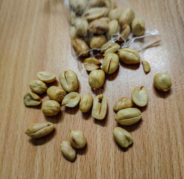 Fried Peanuts on an Office Desk Stock Image - Image of desk, peanuts ...