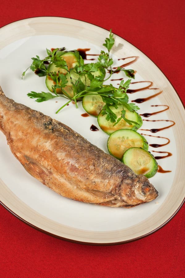 Fried peled fish stock image. Image of garnish, natural - 32293033