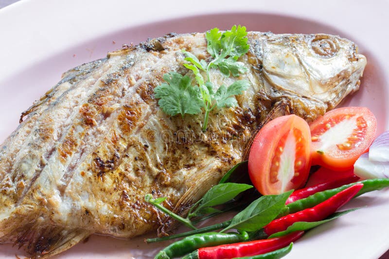 Fried Pickled Fish , Tomato and Chili Stock Image - Image of lettuce ...