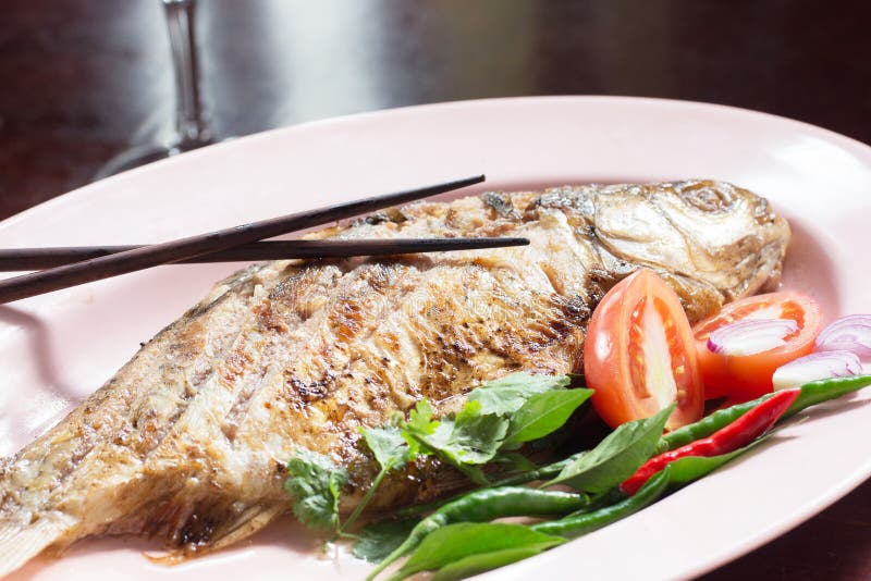 Fried Pickled Fish , Tomato and Chili Stock Photo - Image of gourmet ...