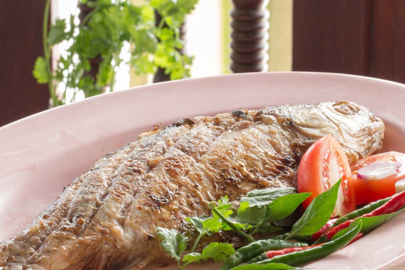 Fried Pickled Fish , Tomato and Chili Stock Image - Image of leaf ...