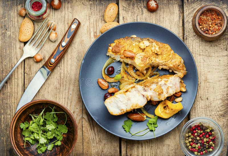 Fried piece of fish stock image. Image of baked, portion - 181596855