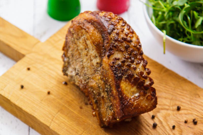 Fried Piece of Pork on a Cutting Board Side View Stock Photo - Image of ...