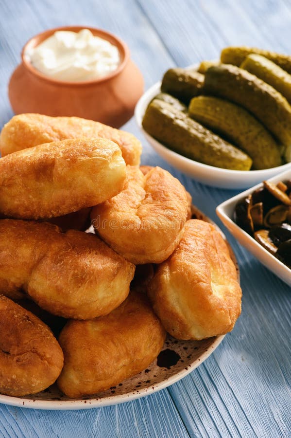 Fried Pies on Wooden Table, Russian Style Cuisine. Stock Image - Image ...