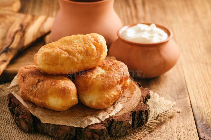 Fried Pies on Wooden Table, Russian Style Cuisine. Stock Photo - Image ...
