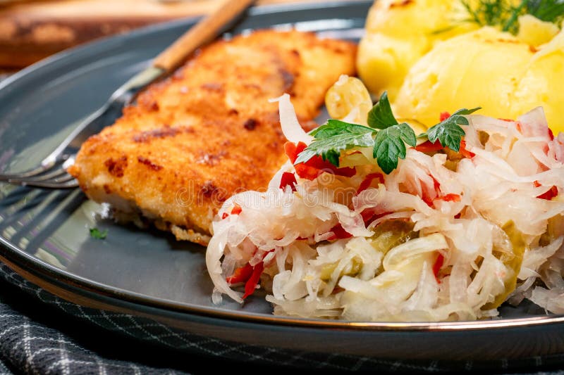 Fried pollock fillet stock image. Image of tasty, sauerkraut - 349692533