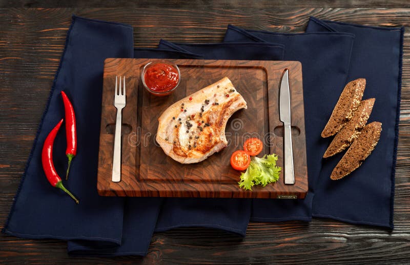 Fried Pork Entrecote on a Board for Serving Stock Image - Image of bone ...