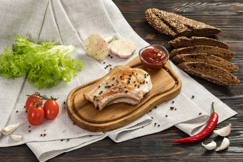 Fried Pork Entrecote on a Board for Serving Stock Image - Image of slab ...