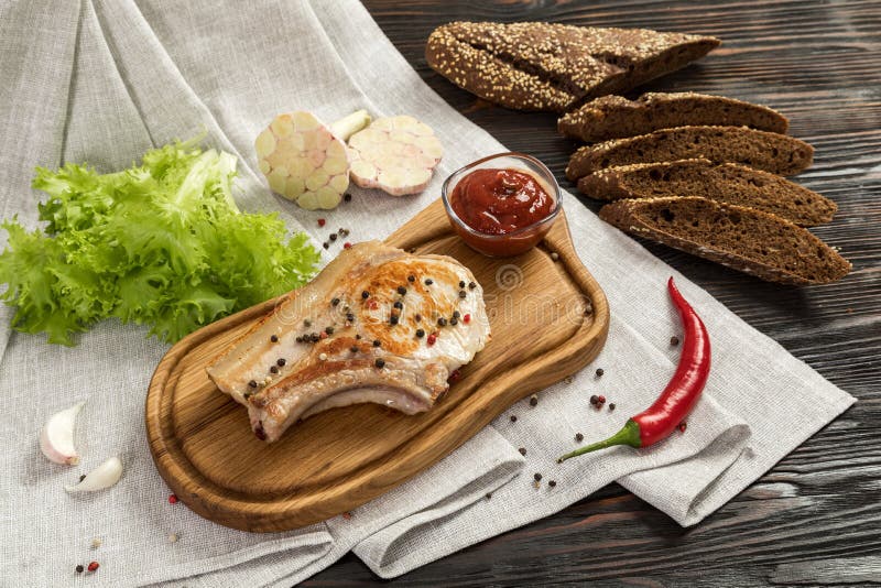 Fried Pork Entrecote on a Board for Serving Stock Photo - Image of ...