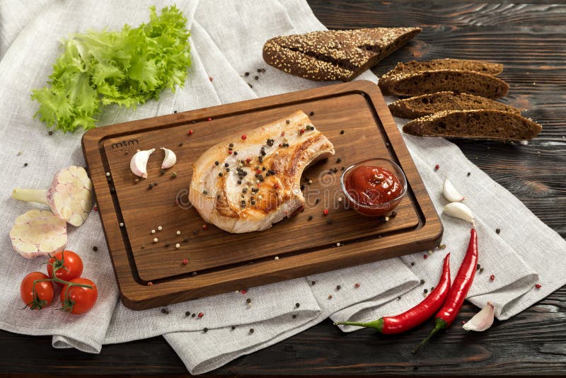 Fried Pork Entrecote on a Board for Serving Stock Image - Image of ...