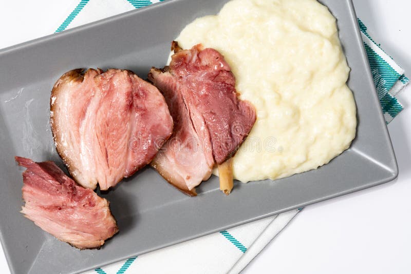 Fried Pork Knuckle Served with Mashed Potatoes on the Plate Stock Photo ...