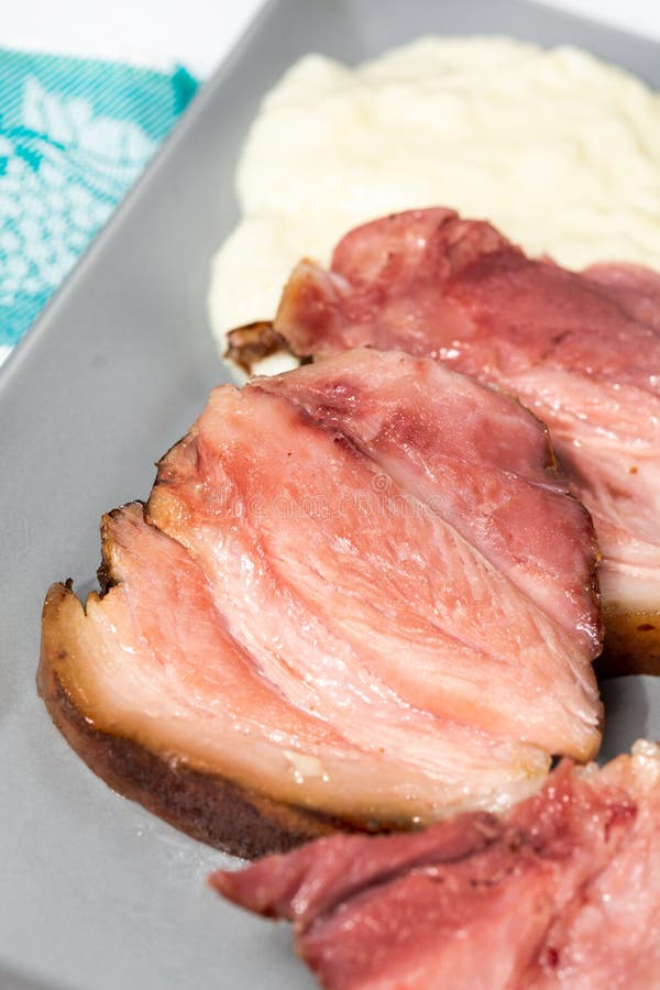 Fried Pork Knuckle Served with Mashed Potatoes on the Plate Stock Photo ...