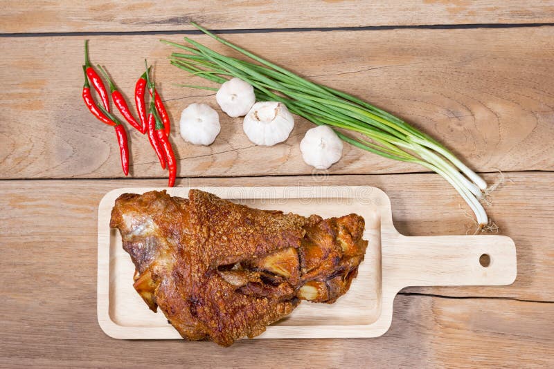 Fried Pork Leg Cooked on Chopping Block Stock Photo - Image of onion ...