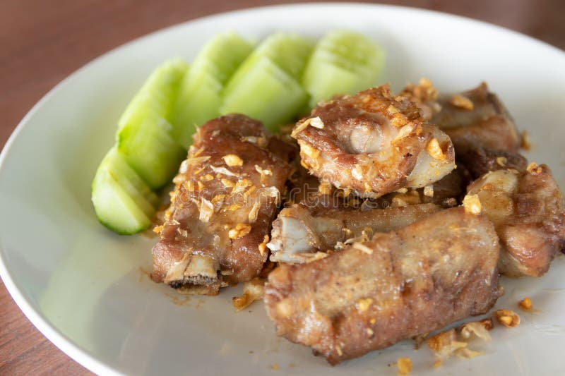 Fried Pork Ribs with Garlic Stock Photo - Image of garlic, thai: 269477302