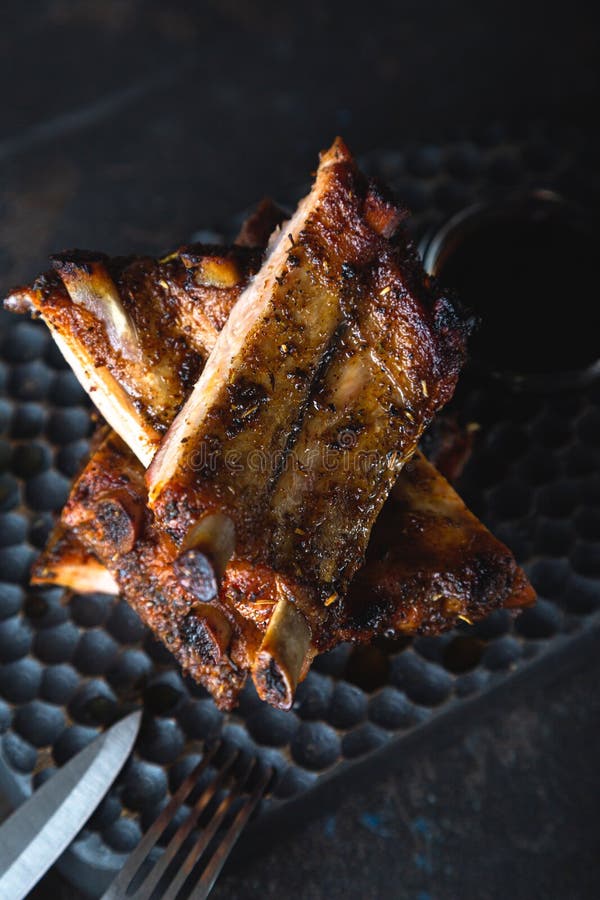 Fried pork ribs with sauce stock photo. Image of meat - 244666132