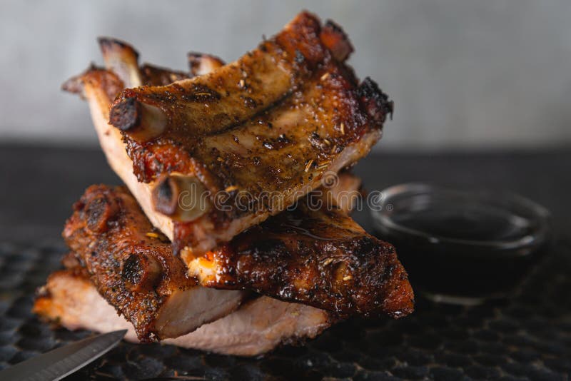 Fried pork ribs with sauce stock photo. Image of barbeque - 244666136