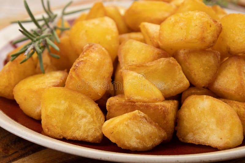 Fried Potato Pieces on a Plate Stock Photo - Image of table, vegetarian ...