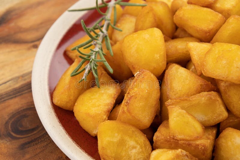 Fried Potato Pieces on a Plate Stock Image - Image of table, potato ...