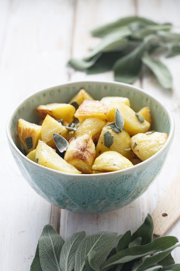 Fried potato with sage stock photo. Image of crispy, baked - 30708402