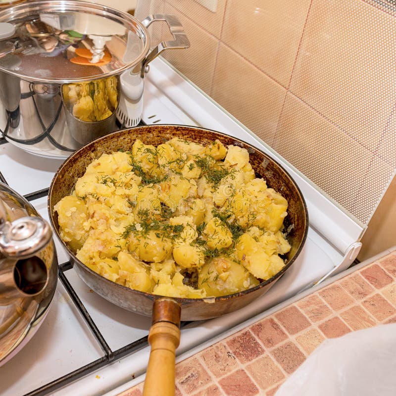 Fried Potatoes with Dill in a Pan on Gas Stove Stock Image - Image of ...