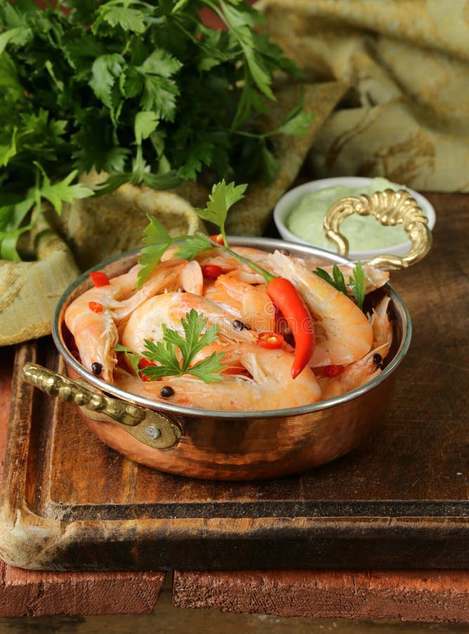 Fried Prawns with Chilli in a Copper Pan Stock Photo - Image of food ...