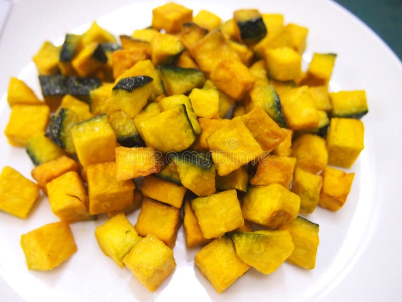 Cutting an Ice Cube with a Special Machine Knife on the Plant Stock ...