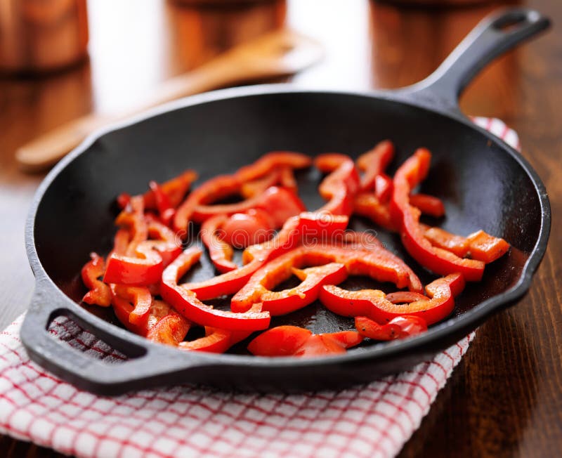 Fried Red Bell Peppers Cooling in Iron Skillet Stock Image - Image of ...