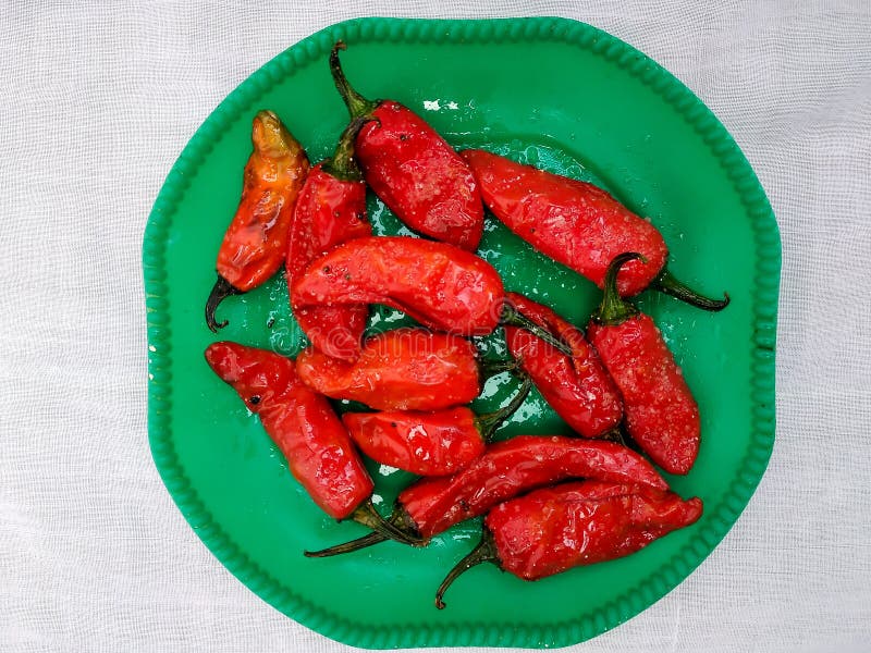 Fried Red Chillies in a Dish of Green Color Stock Photo - Image of ...