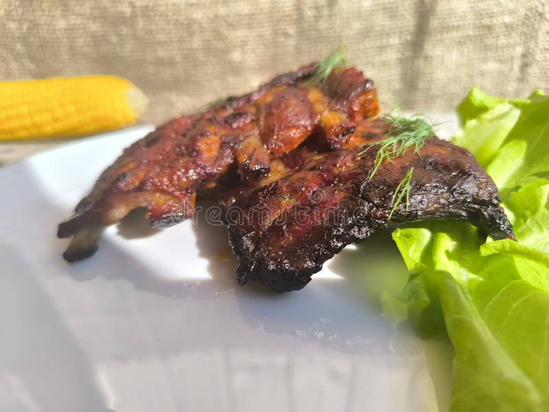 Fried Ribs on a White Plate. Stock Photo - Image of sunlight, wine ...
