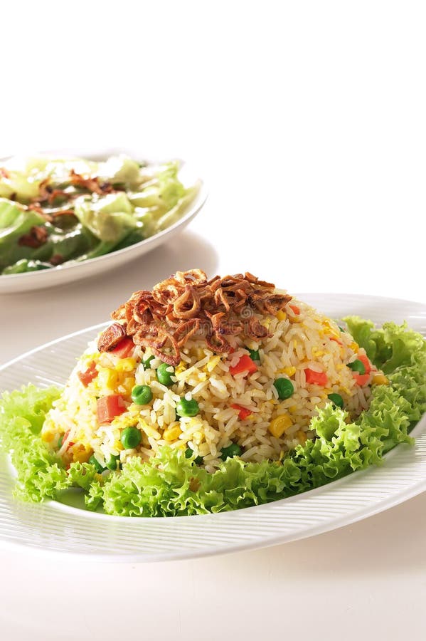 Fried Rice in White Ceramic Plate on Wood Table Stock Image - Image of ...