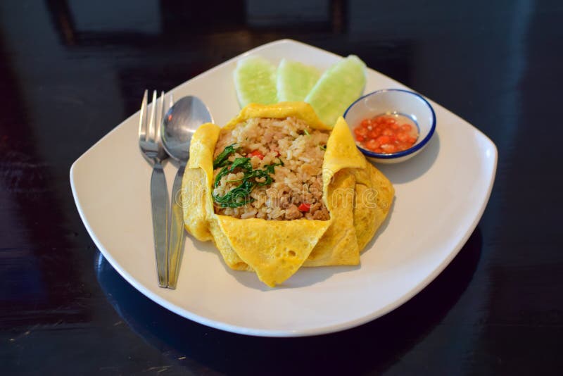 Fried Rice with Basil with Egg Wrap Stock Photo - Image of good ...