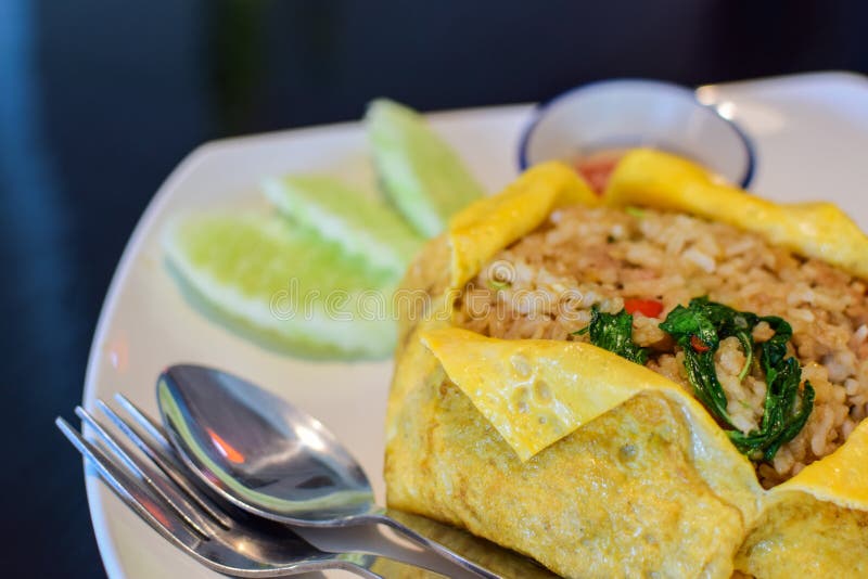 Fried Rice with Basil with Egg Wrap Stock Photo - Image of basil, sell ...