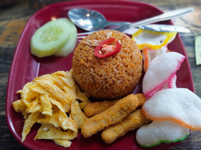 Fried Rice Comes with Fried Egg, Crackers and Nuggets Stock Photo ...