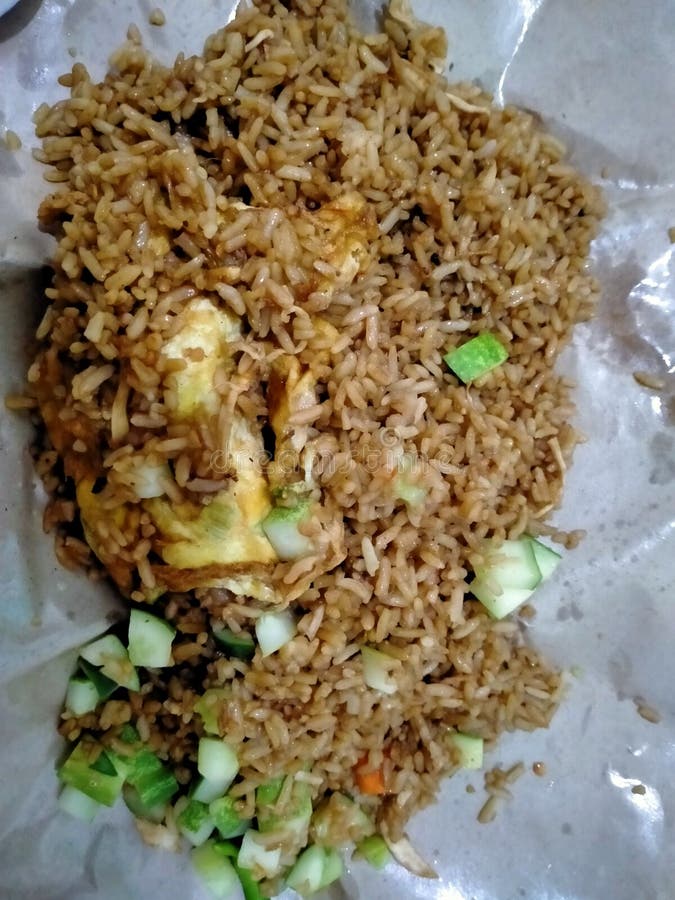 Fried Rice with a Delicious Mixture of Carrots and Cucumber Stock Photo ...