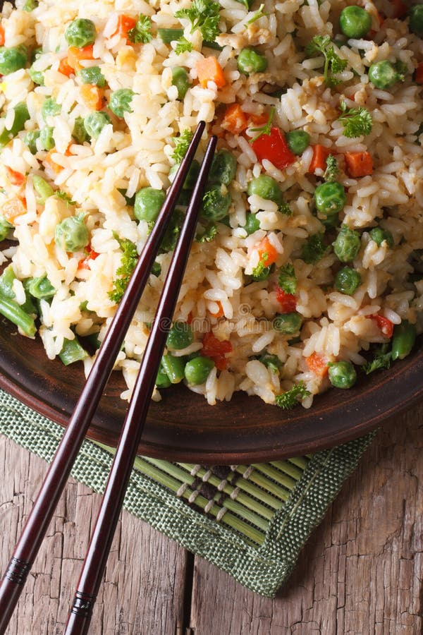 Fried Rice with Egg, Peas, Carrots Close-up Vertical Top View Stock ...