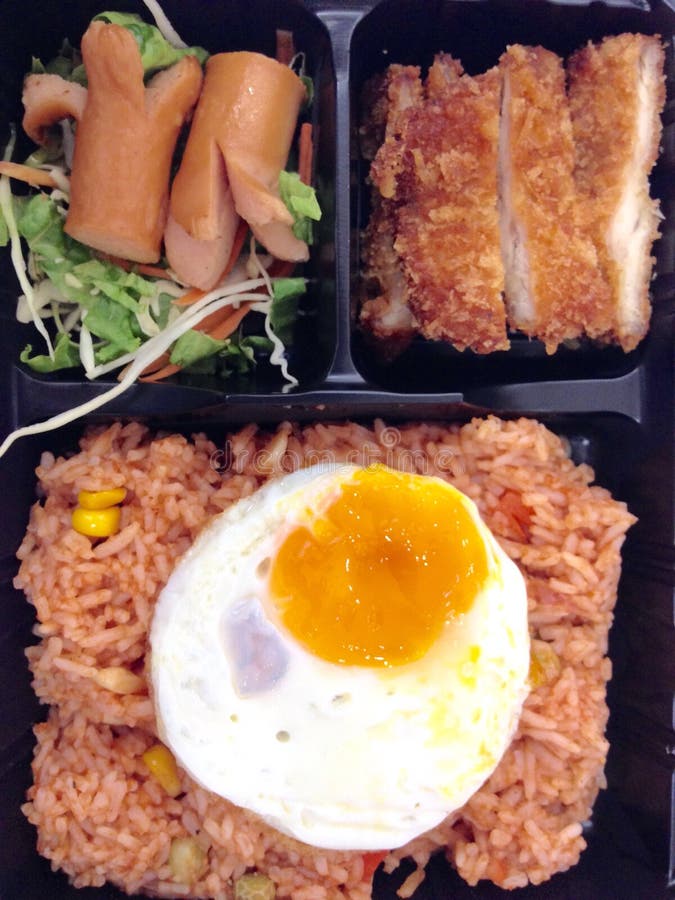 Fried Rice with Hotdog, Egg and Fried Chicken Stock Image - Image of ...